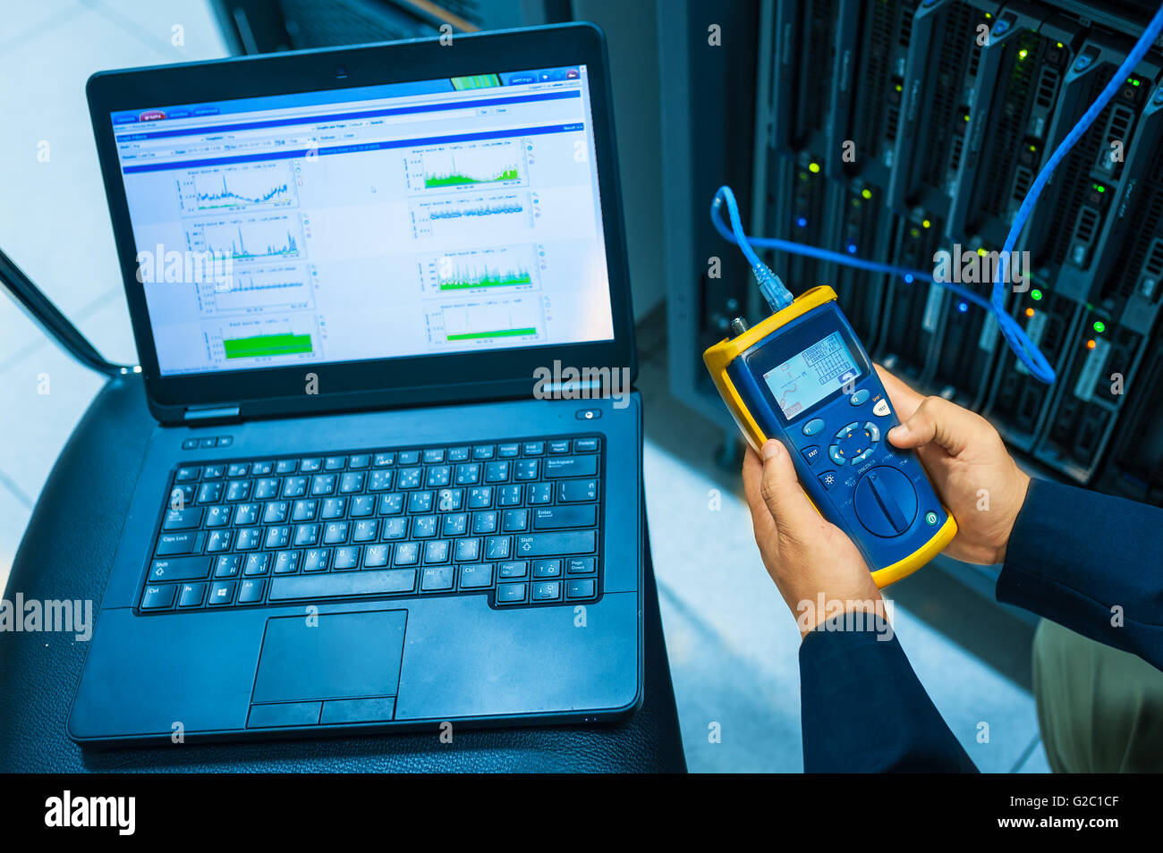 Man fix server network in data center room Stock Photo - Alamy