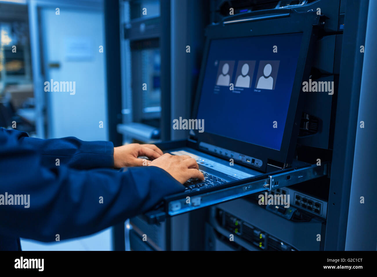 Man fix server network in data center room Stock Photo - Alamy