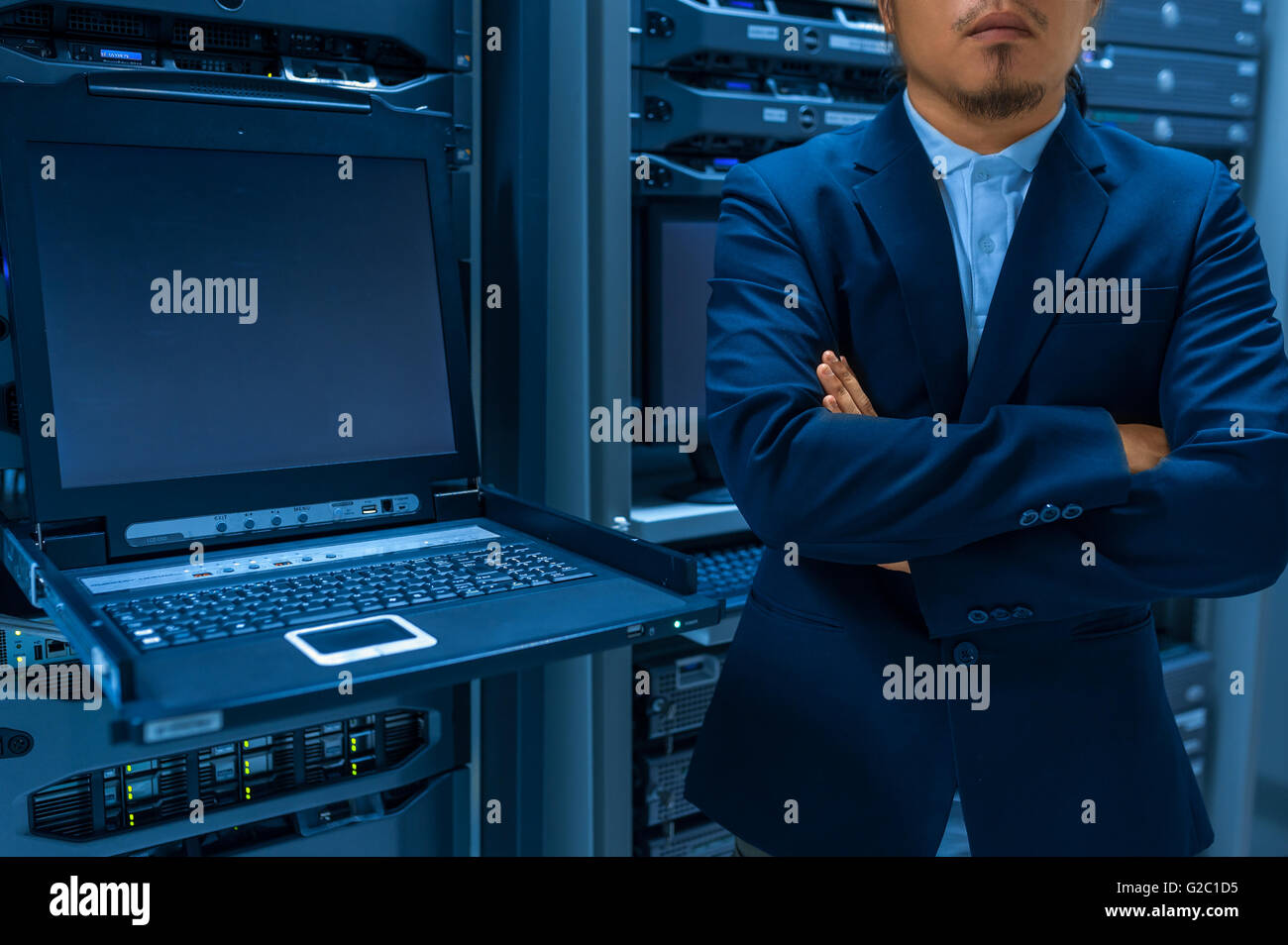 Man fix server network in data center room Stock Photo - Alamy