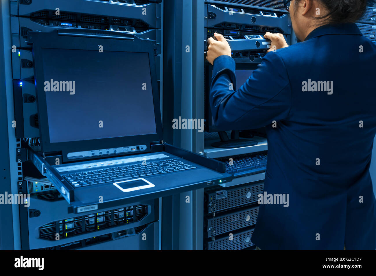 Man fix server network in data center room Stock Photo - Alamy