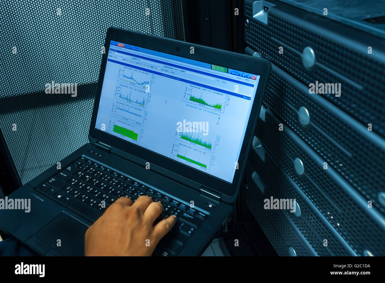 Man fix server network in data center room Stock Photo - Alamy
