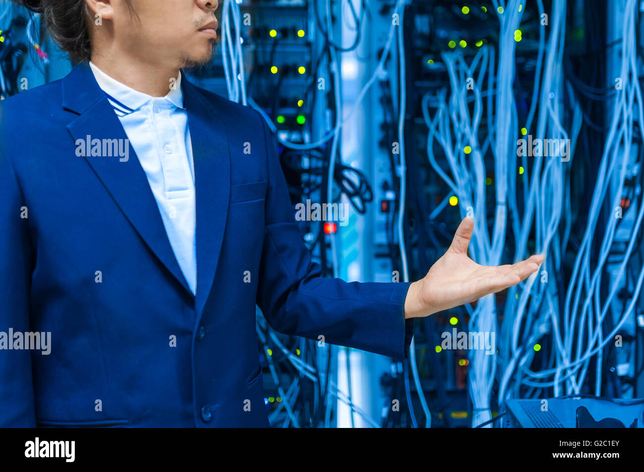 People fix core switch in network room Stock Photo - Alamy