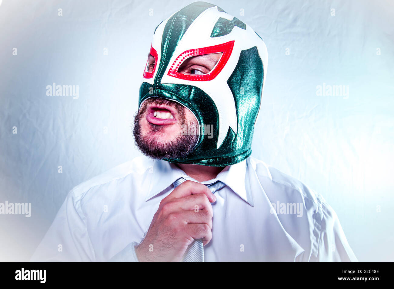 Manager, angry businessman with Mexican wrestler mask, expressions of ...