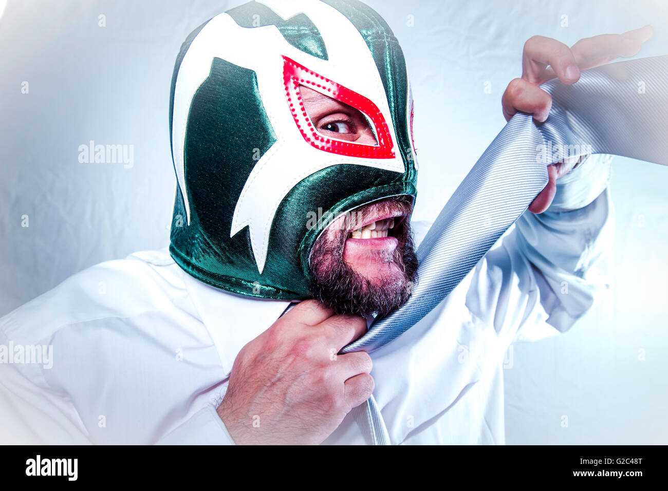Shocked, angry businessman with Mexican wrestler mask, expressions of ...