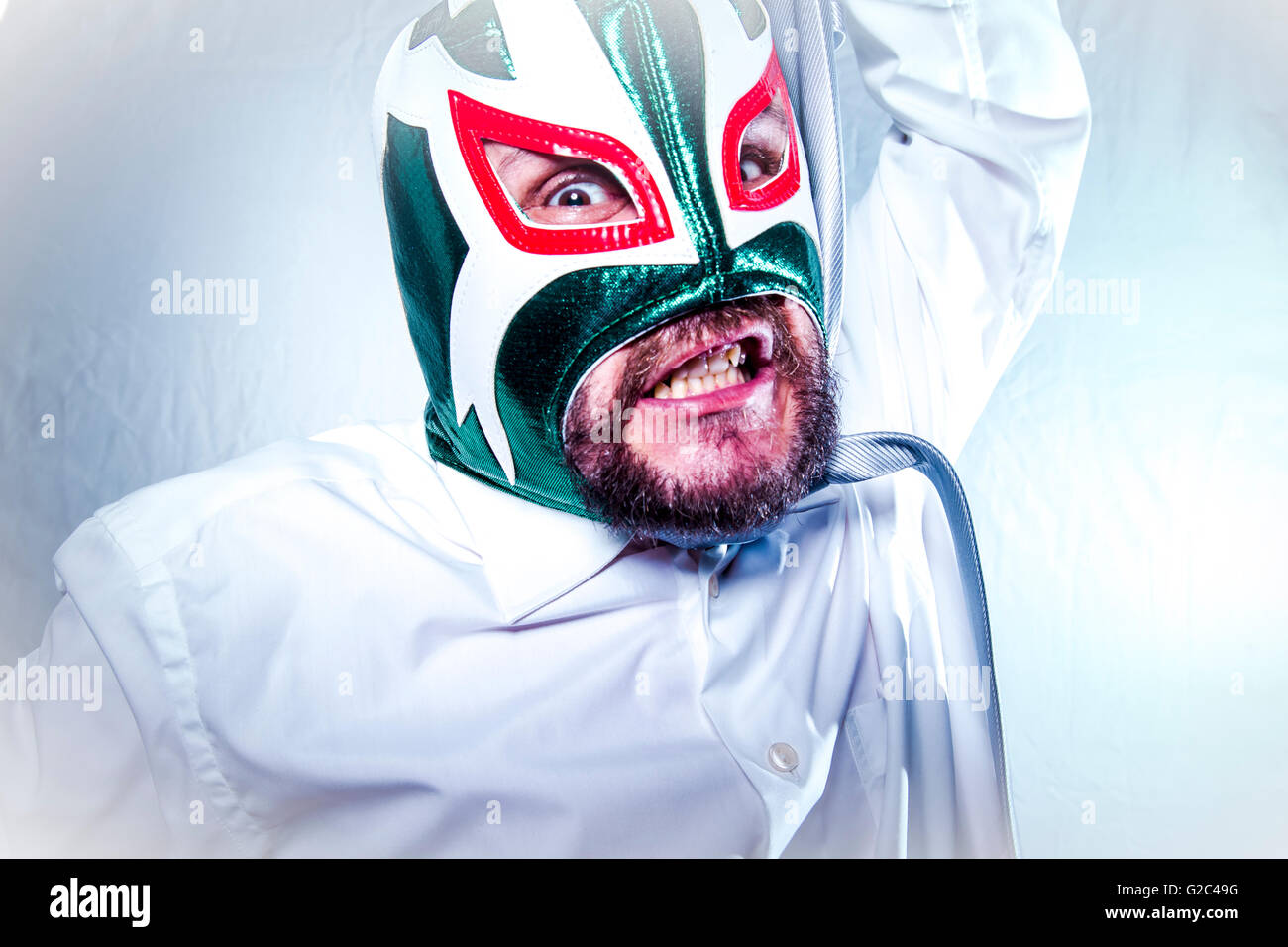 angry businessman with Mexican wrestler mask, expressions of anger and ...