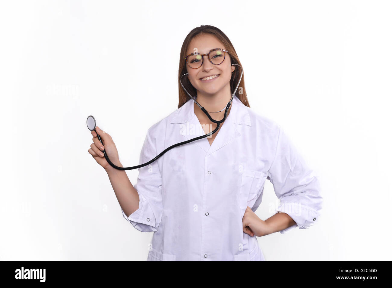 Close up of a beautiful doctor with a stethoscope. Isolated white ...