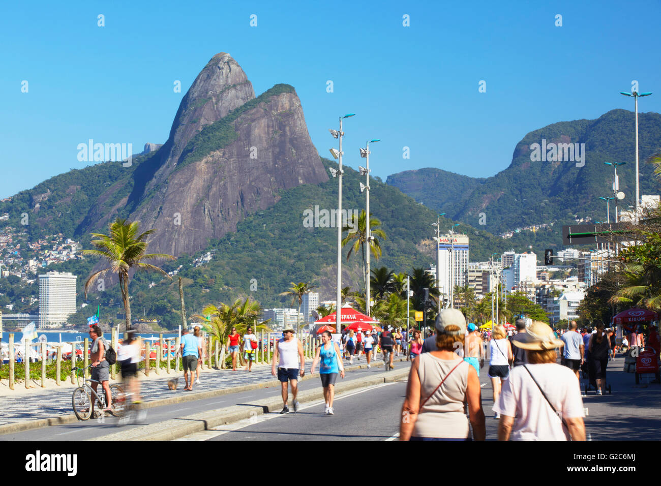 People walking along pedestrianised street on Sunday, Ipanema, Rio de ...