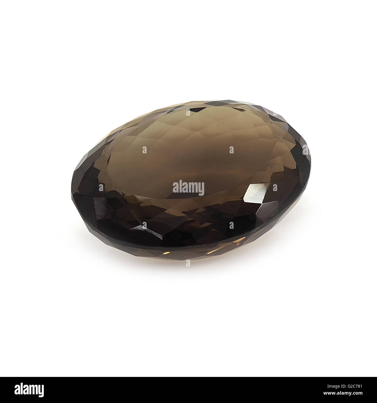 Oval shaped faceted smoky quartz on a white background Stock Photo - Alamy