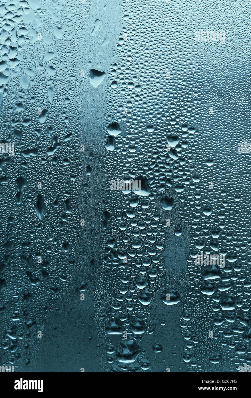 natural large and fine water drops on green glass Stock Photo - Alamy