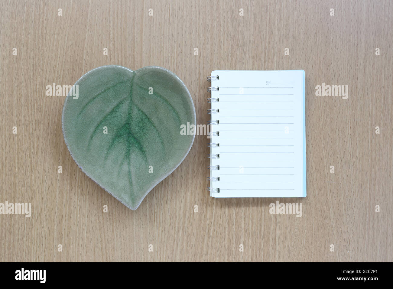 kitchen utensils and note book on wood background for design Concept in ...