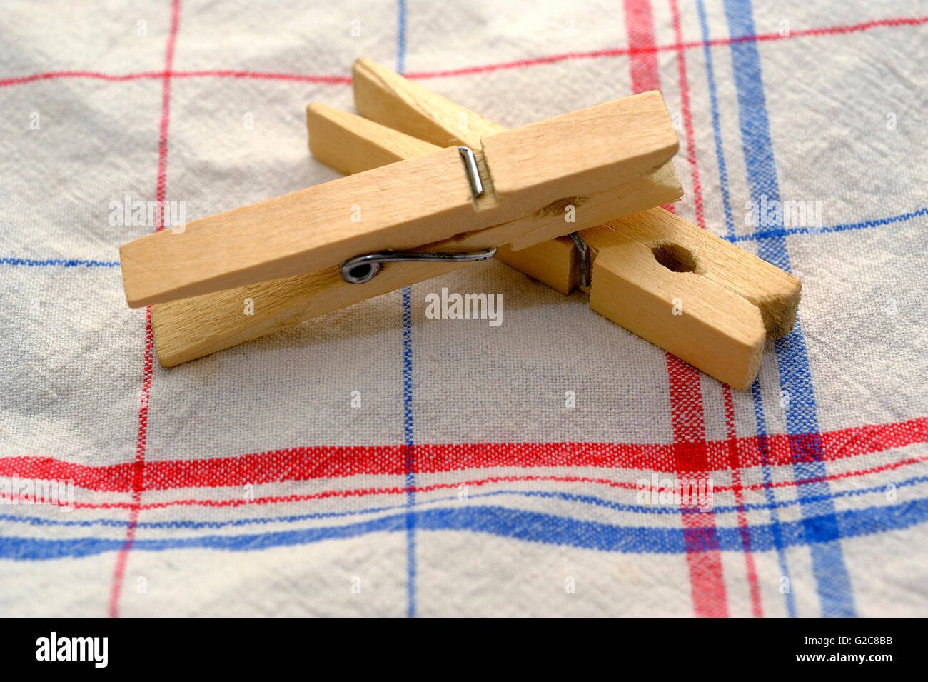 cloths tongs photographed on a cloth background Stock Photo - Alamy