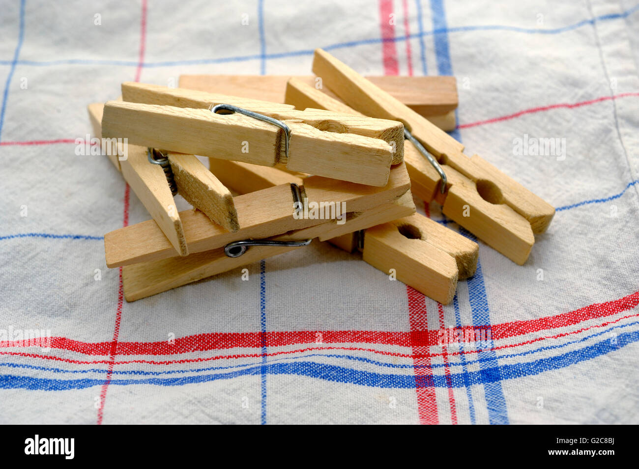 cloths tongs photographed on a cloth background Stock Photo - Alamy
