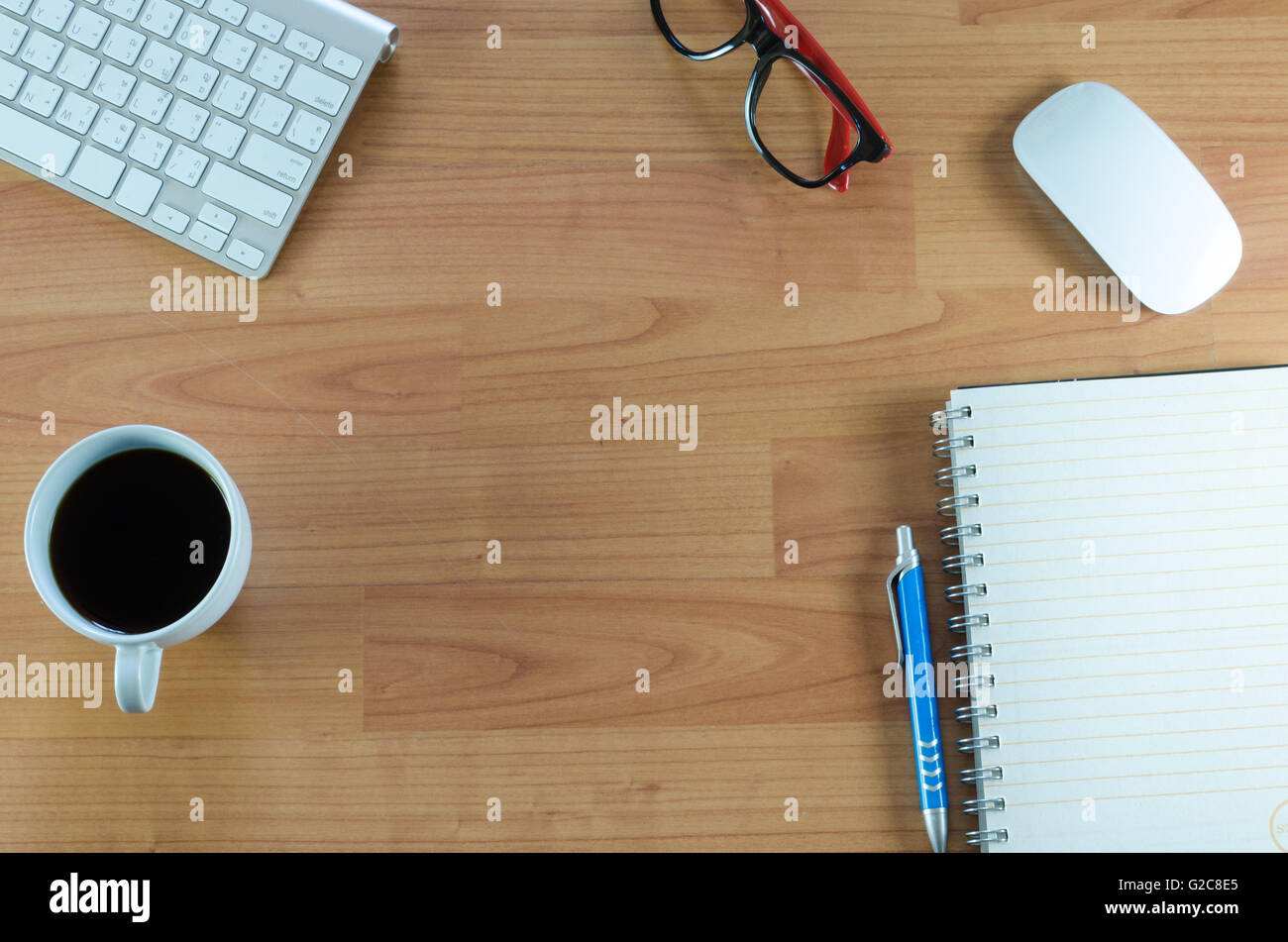 Workplace with keyboard computer and pen on table Stock Photo - Alamy