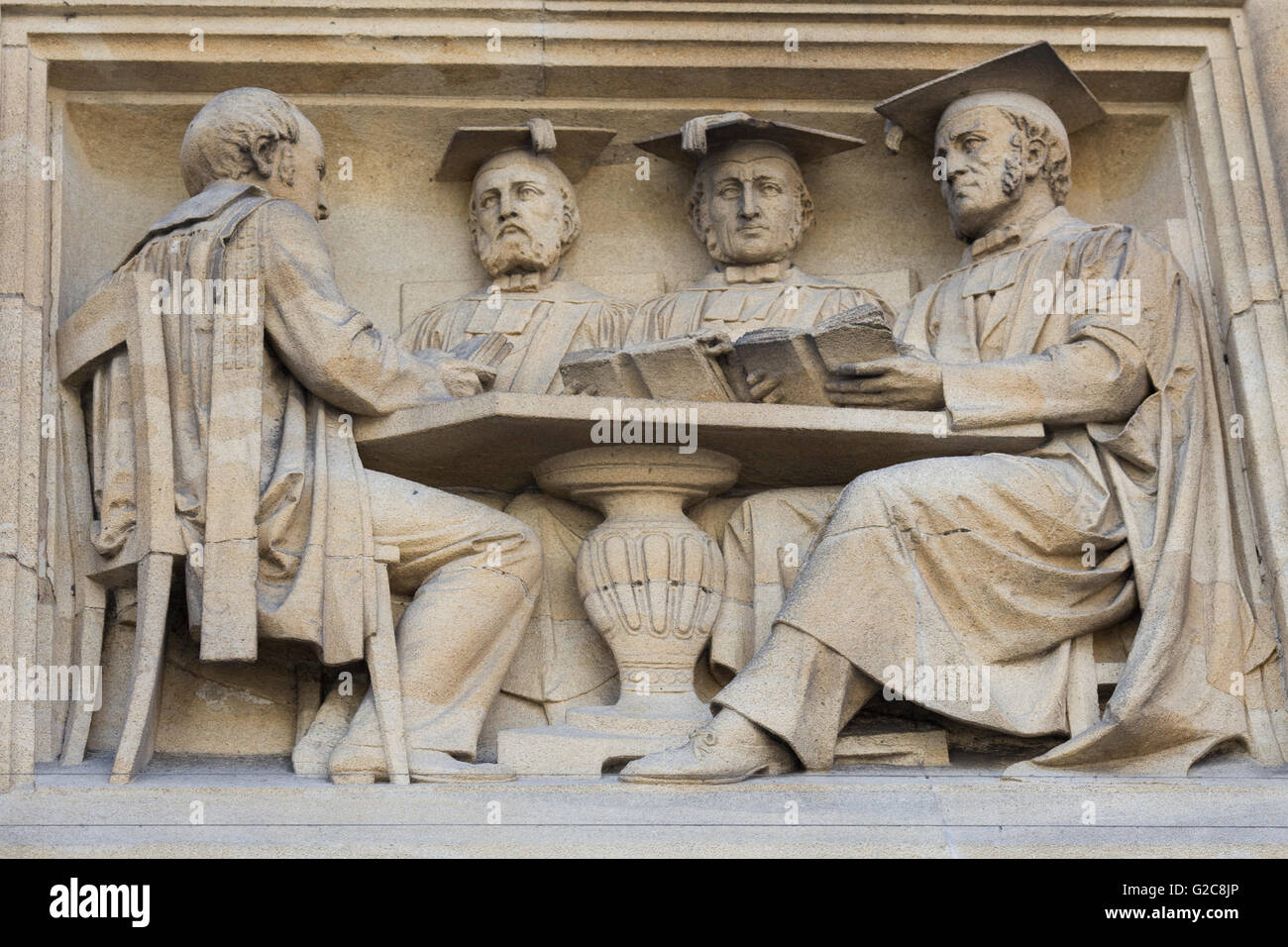 Stone sculpture of scholar's Stock Photo - Alamy