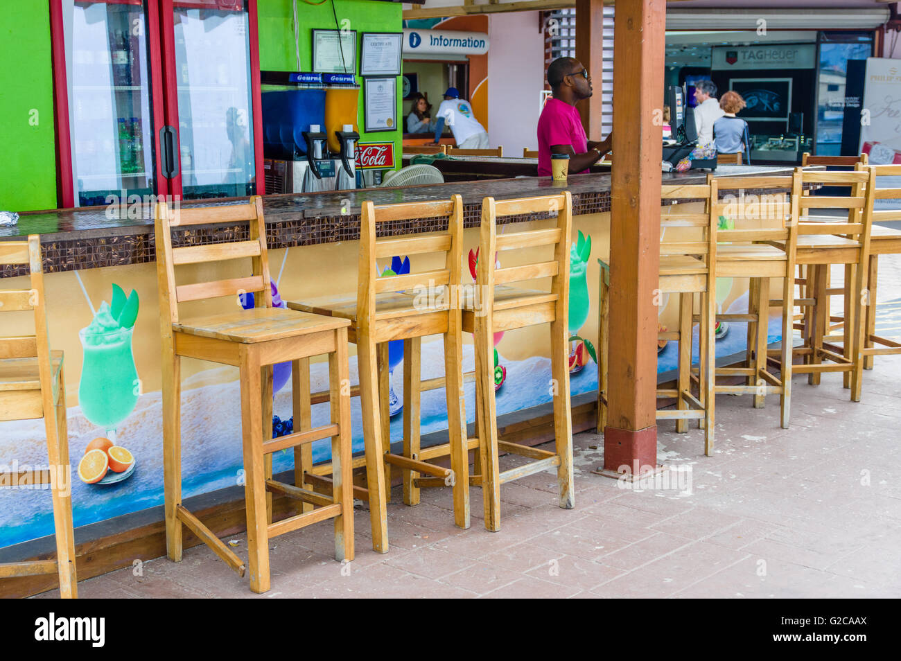 Empty bar stools at the The Wet Lizard bar in Belize City, Belize Stock ... Empty bar stools at the The Wet Lizard bar in Belize City, Belize Stock ...