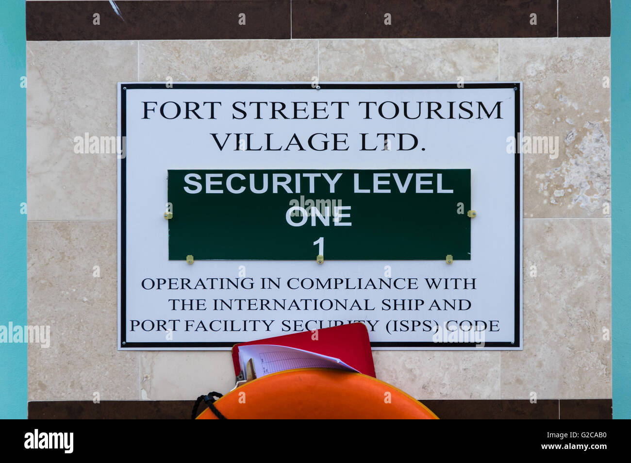 Warninig sign indicating the current security level in Belize City ...