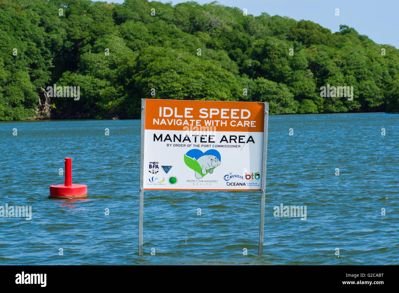 Warning sign telling boaters that Manatees are in the area. Belize City ...