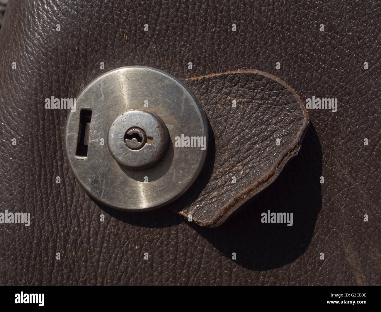 Close up of open lock with keyhole on old worn leather briefcase Stock ...