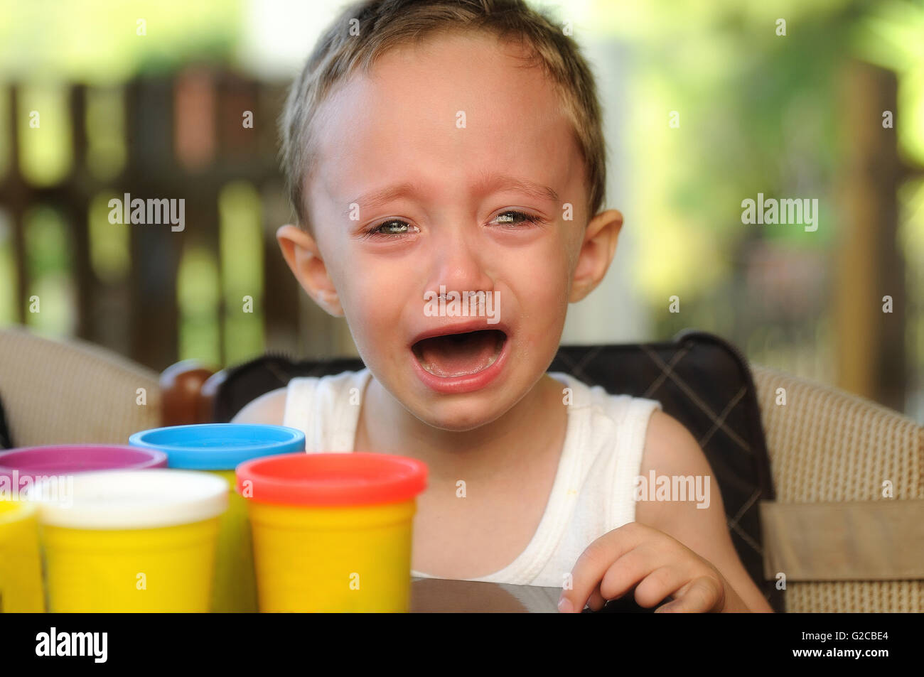 child crying on the terrace of a summer school Stock Photo - Alamy