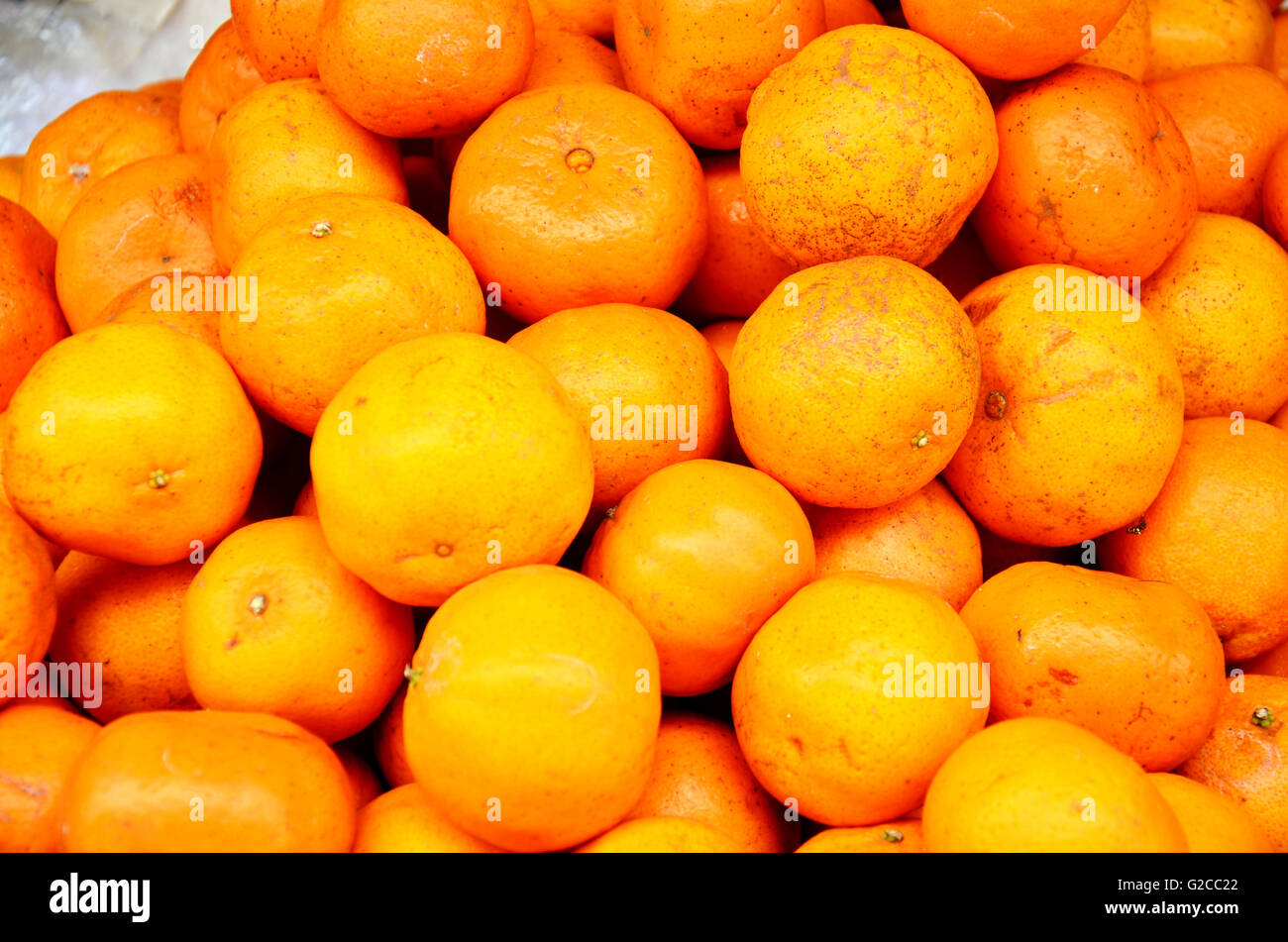 Orange fruits at Fruit Shop or greengrocery on street for sale at ...