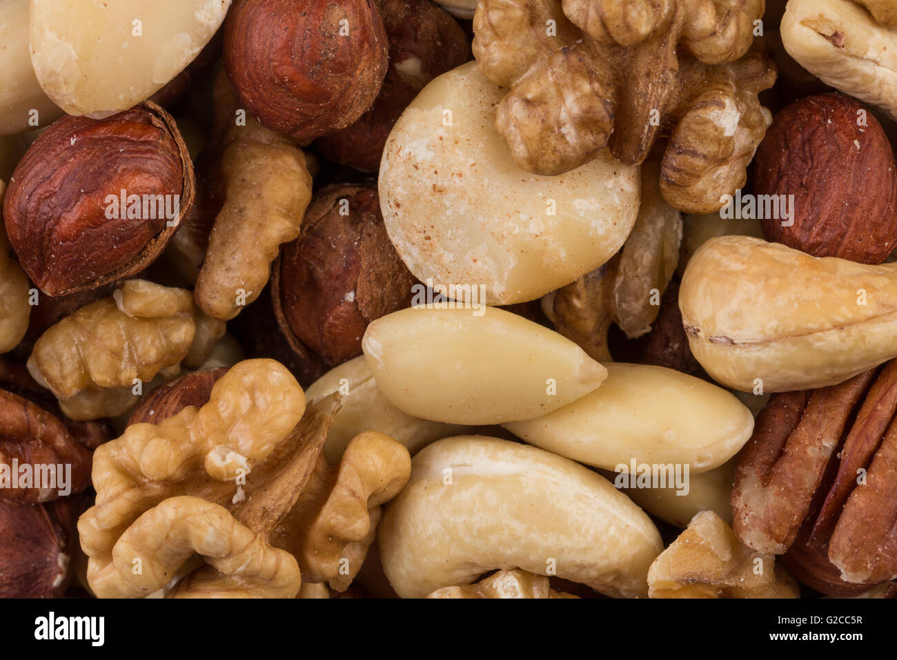 lot of different types of nuts mix for background Stock Photo - Alamy