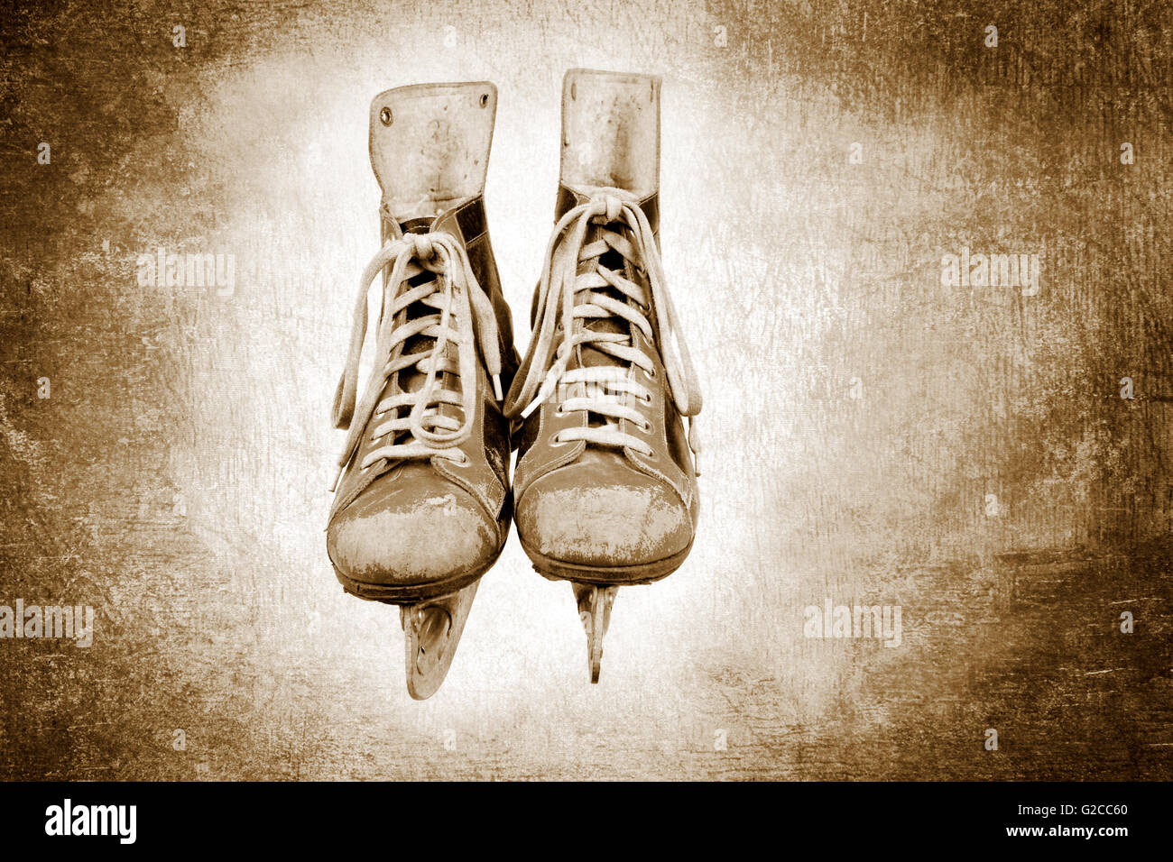 pair of old ice skates, structured background, retro, vintage, black ...