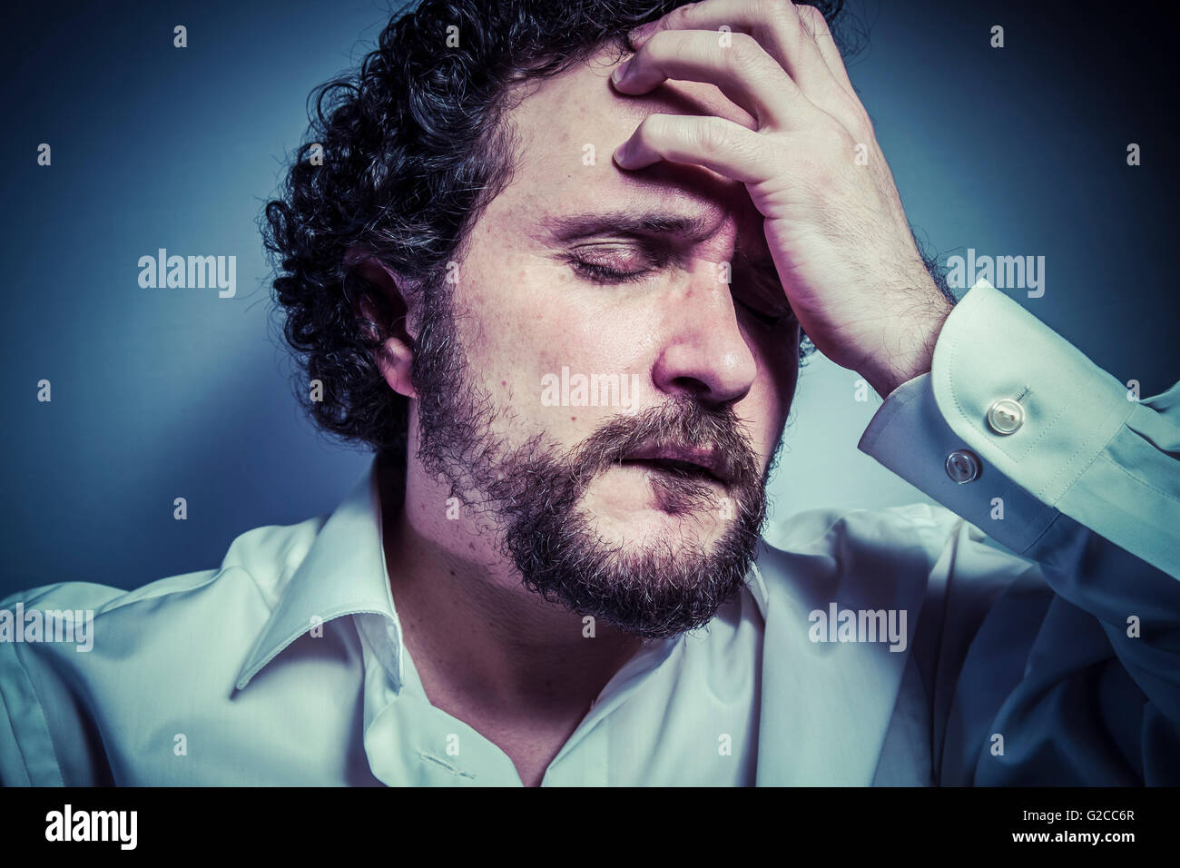 I do not want to hear anything, man with intense expression, white ...