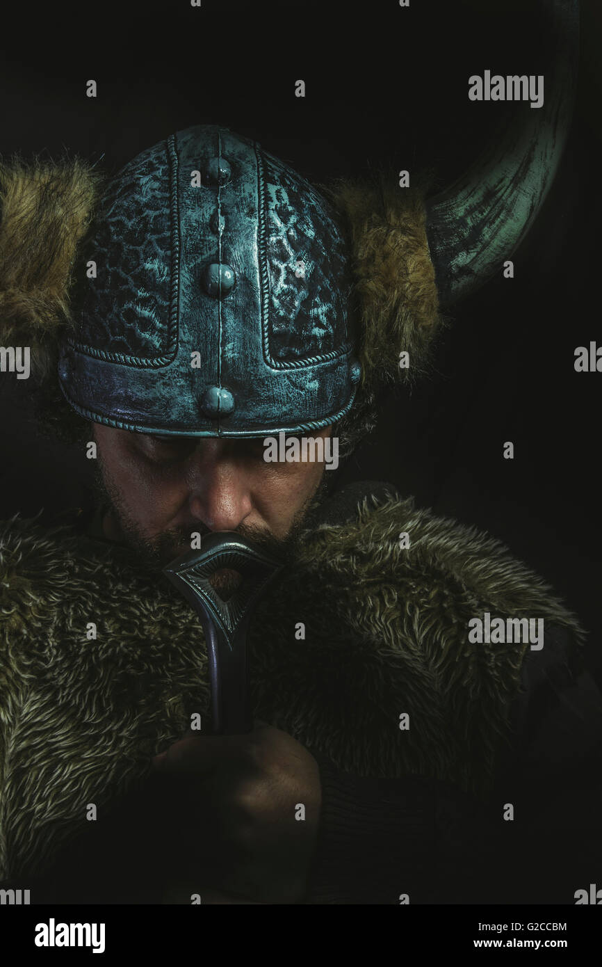 Costume, Viking warrior with a huge sword and helmet with horns Stock ...