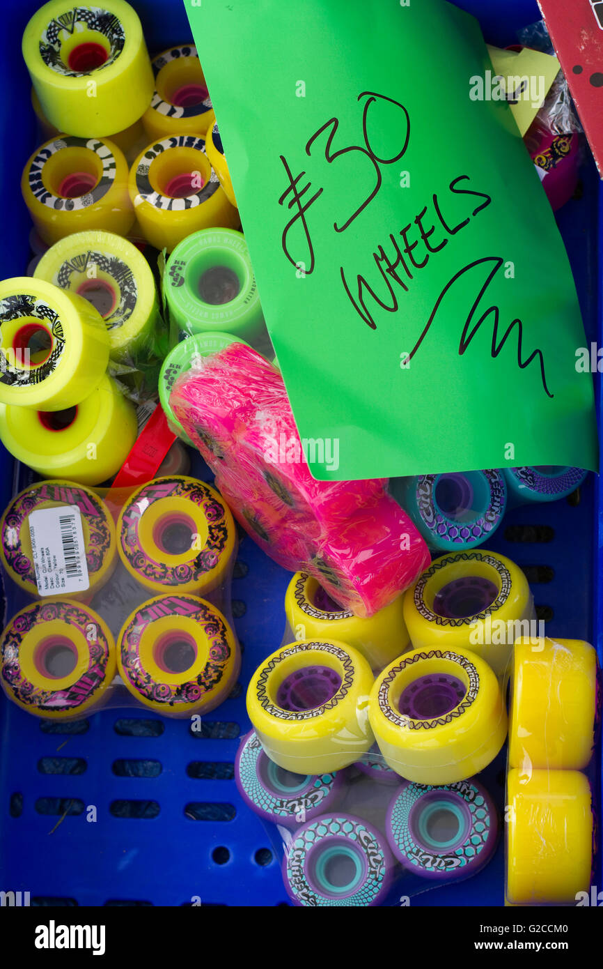 Sets of brightly colored skateboard wheels for sale Stock Photo - Alamy