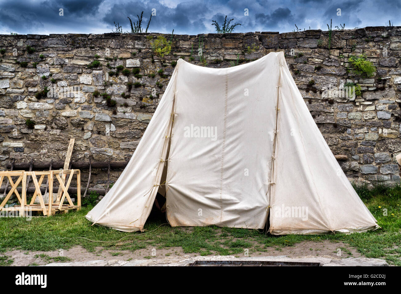 White tent on the ancient walls and the background of the sky Stock ...