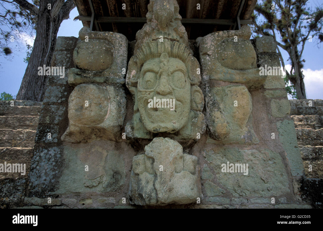 Stone Sculptured Face of the God of the Underworld, East Court in Copan Ruins, archaeological ...