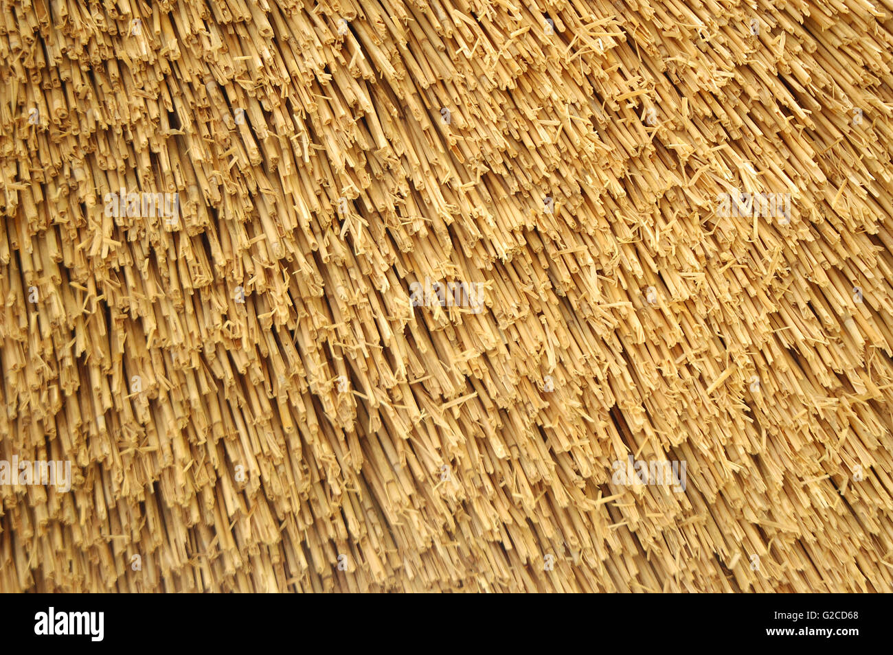 Straw roof cover background Stock Photo - Alamy