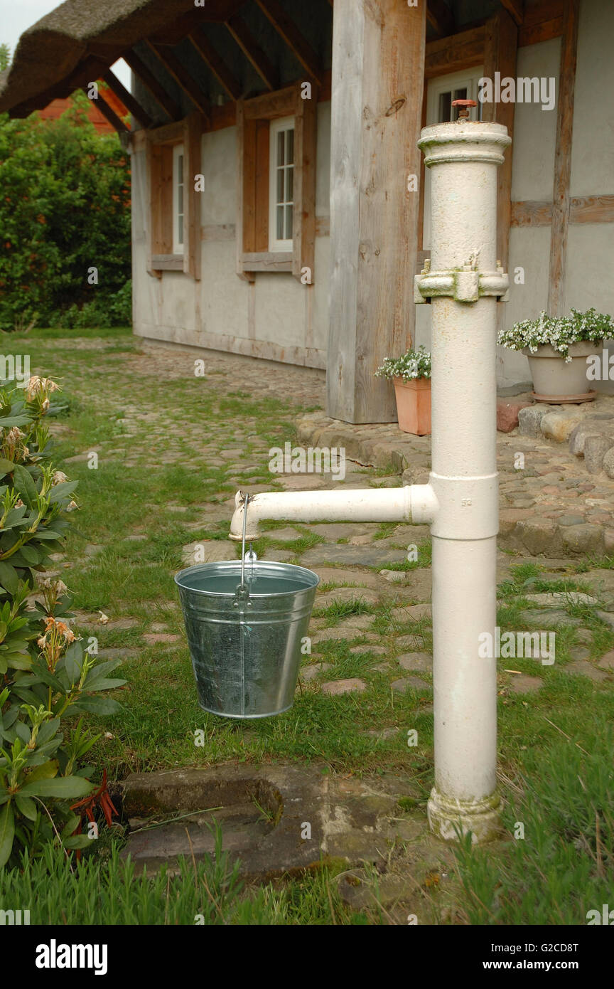 Water pump and bucket hi-res stock photography and images - Alamy