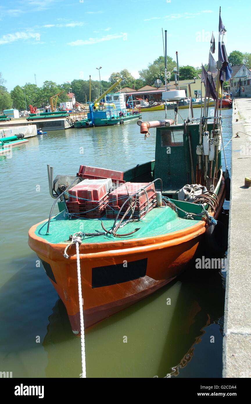 Small fishing vessel in harbour Stock Photo - Alamy