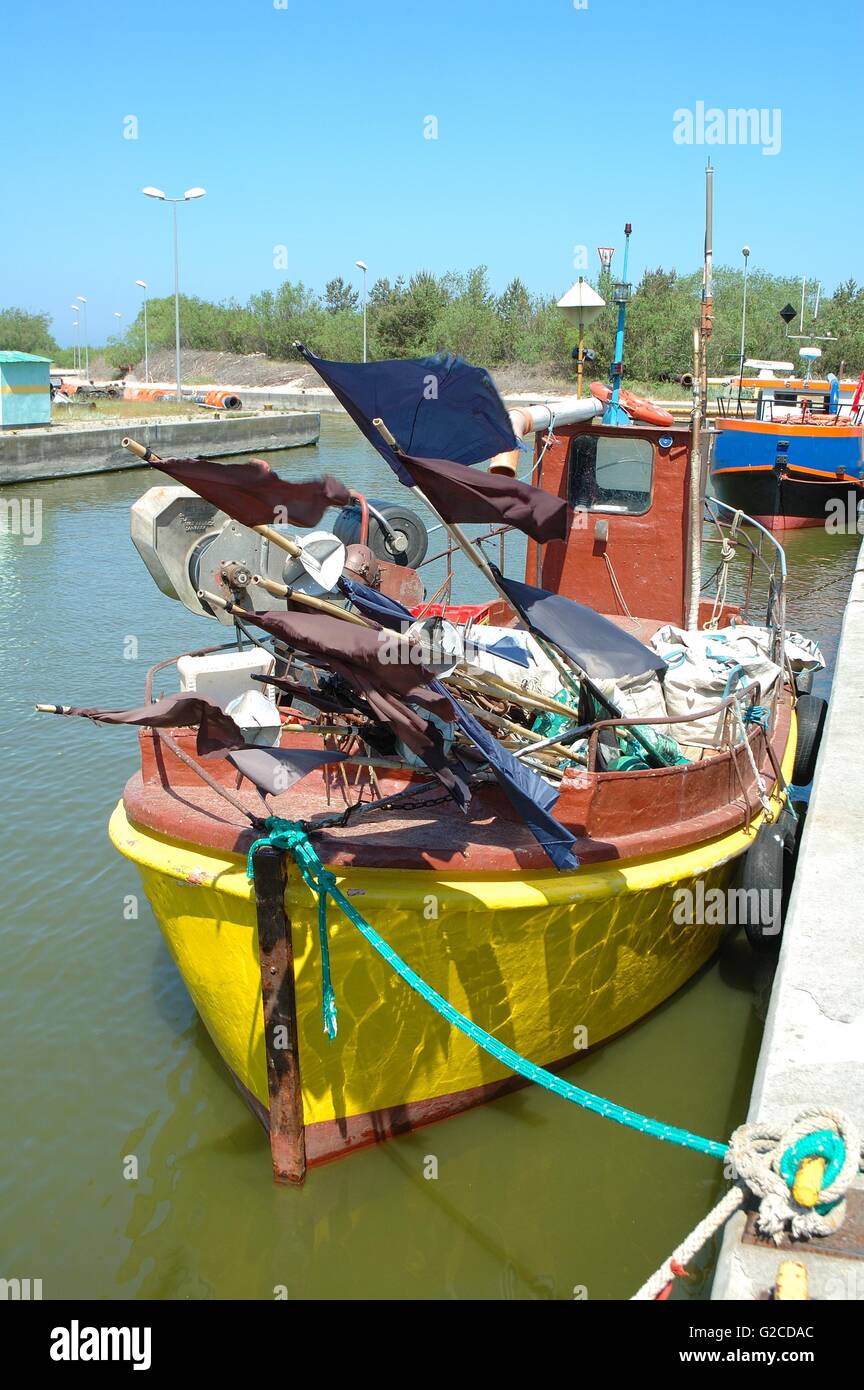 Old small fishing vessels in harbour Stock Photo - Alamy