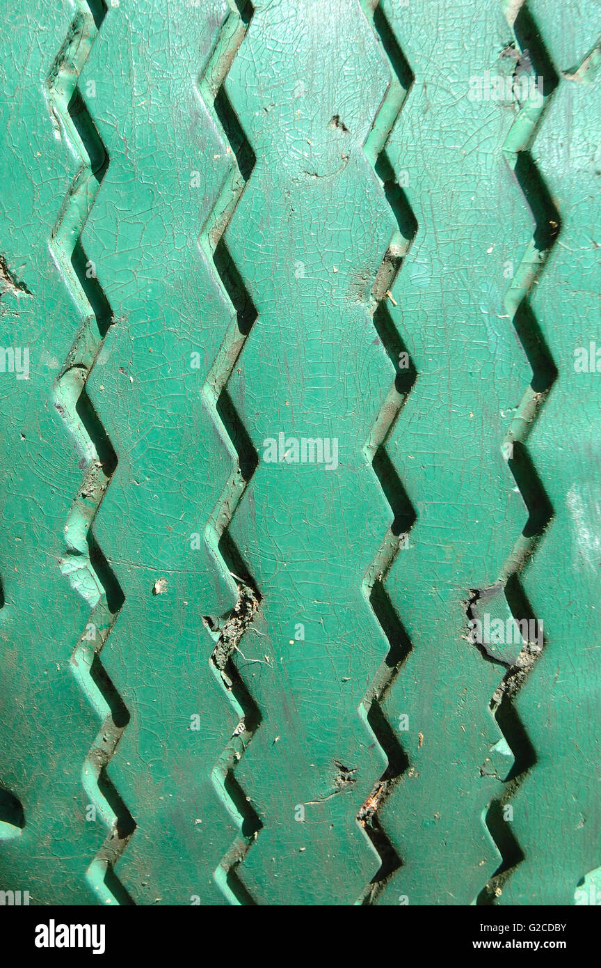 Old painted tyre tread bar close up Stock Photo - Alamy