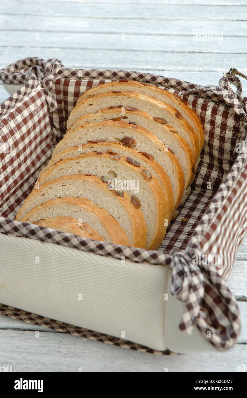 Slices of bread inside bread bin Stock Photo - Alamy