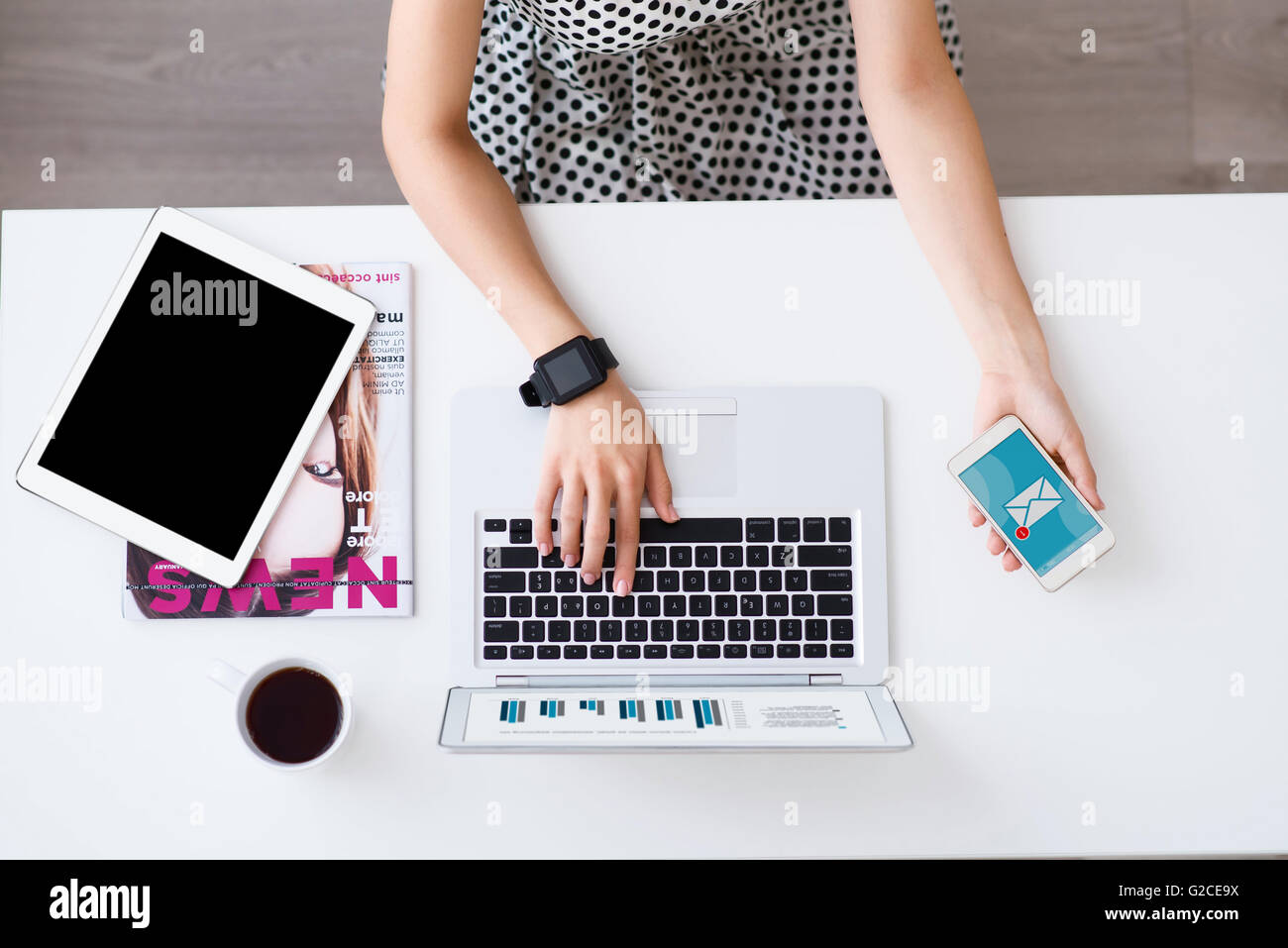 Nice woman working at the table Stock Photo - Alamy