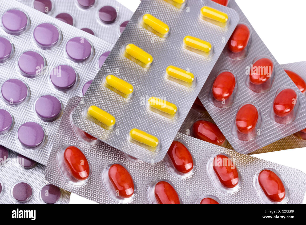 Medicine pills and capsules packed in blisters isolated on white ...