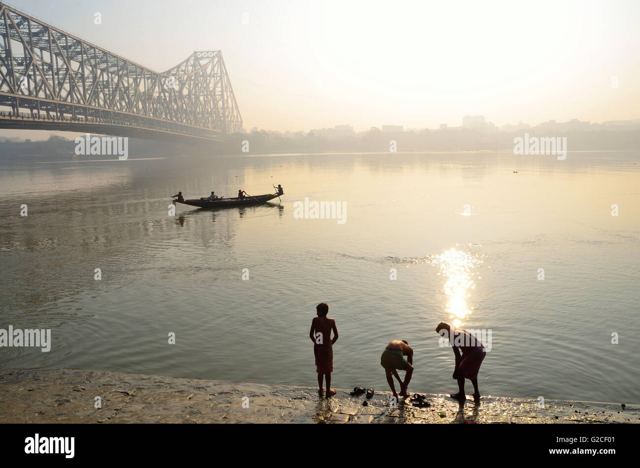 Howrah Bridge at sunrise on a winter morning, Kolkata, West Bengal ...