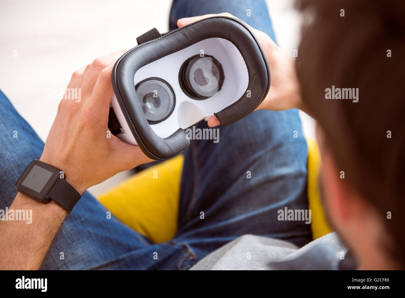 Man holding virtual reality headset Stock Photo - Alamy