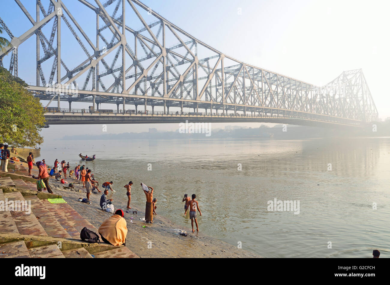 Howrah Bridge at sunrise on a winter morning, Kolkata, West Bengal ...