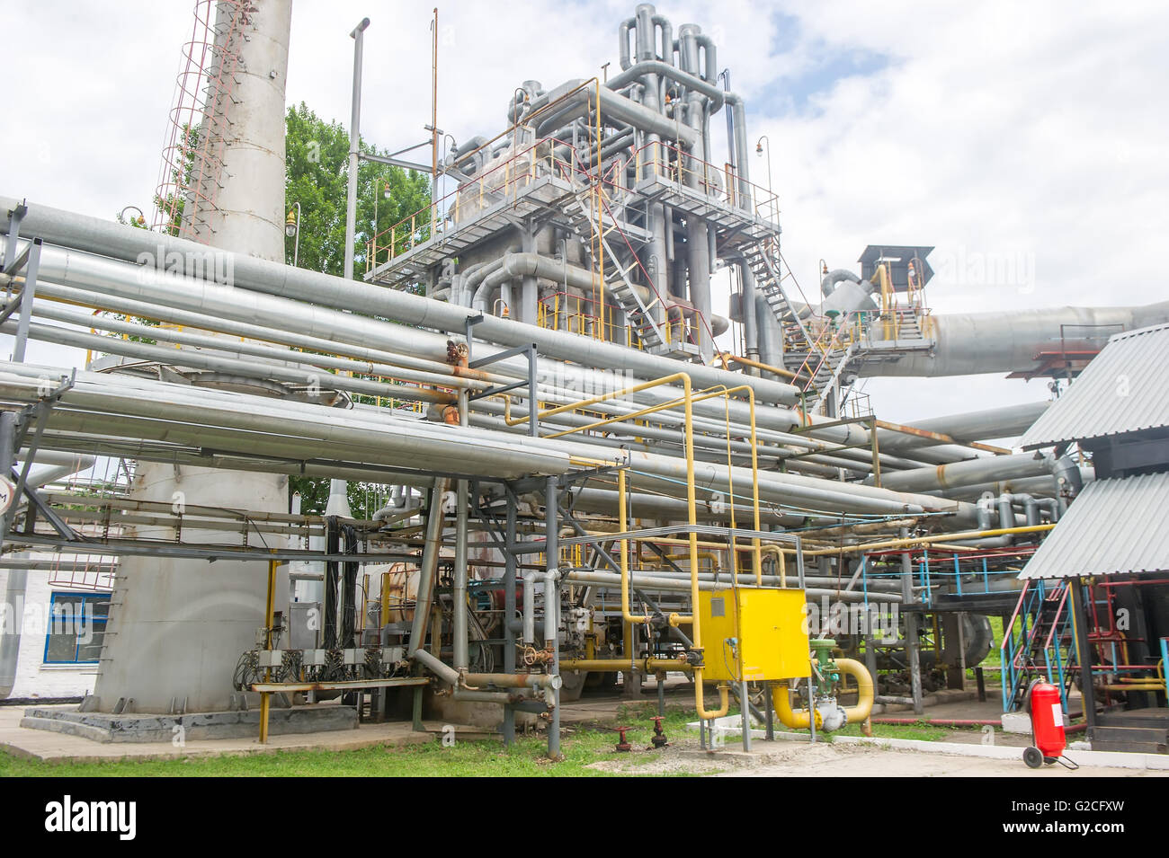 Industrial equipment and pipelines at the gas processing plant on a ...