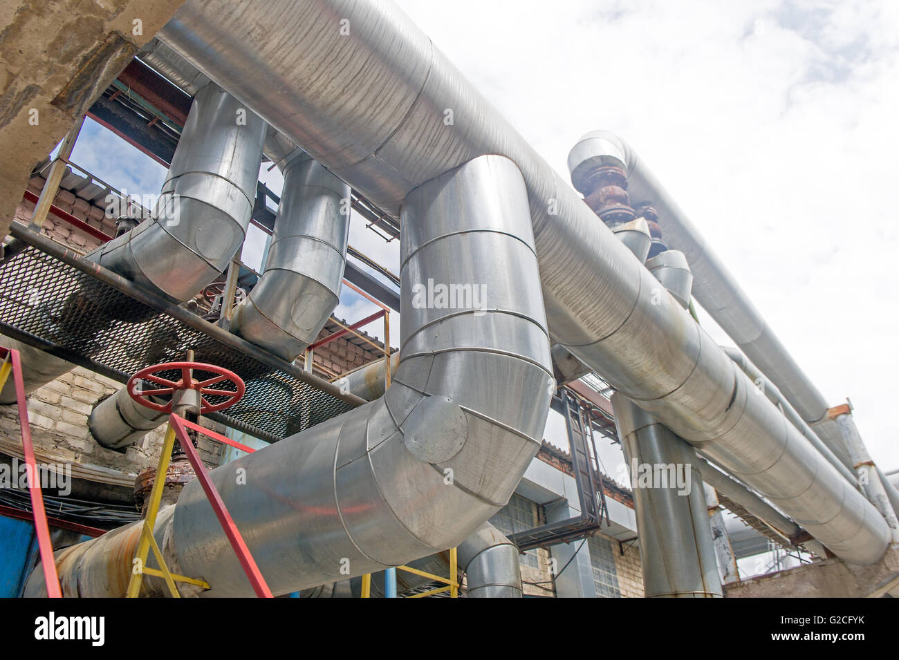 Industrial equipment and pipelines at the gas processing plant on a ...