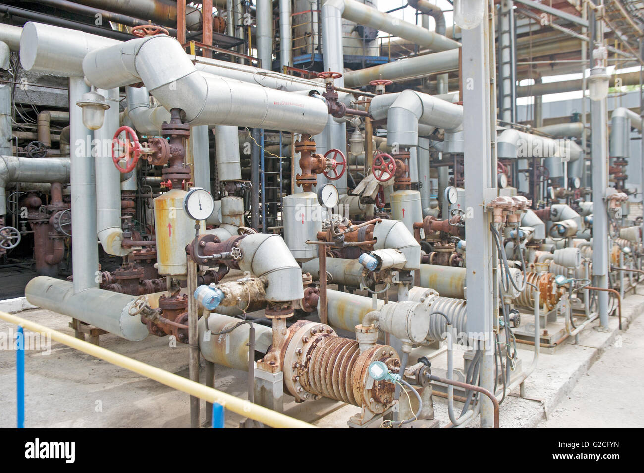 Industrial equipment and pipelines at the gas processing plant on a ...