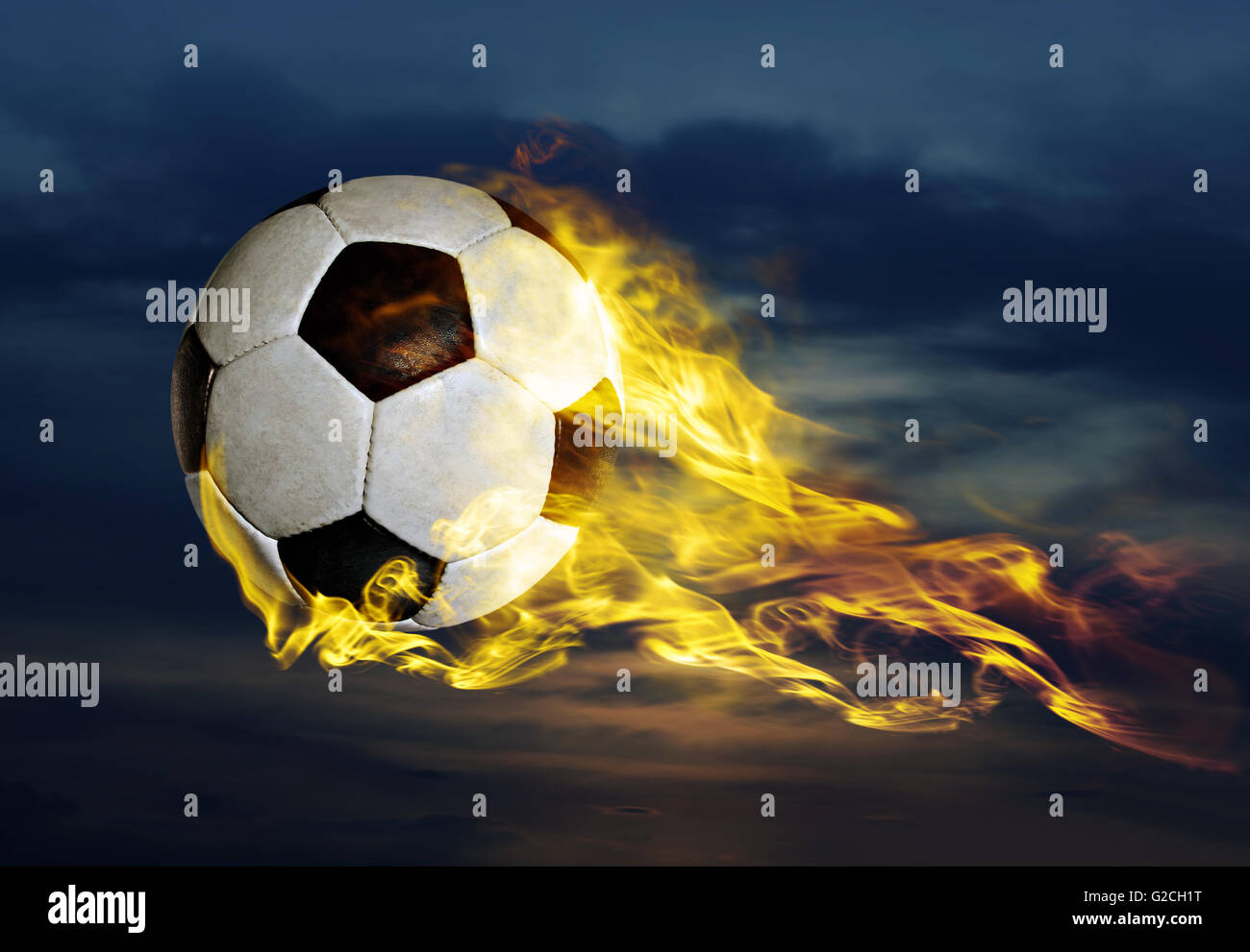 flying fiery soccer ball in sky Stock Photo - Alamy