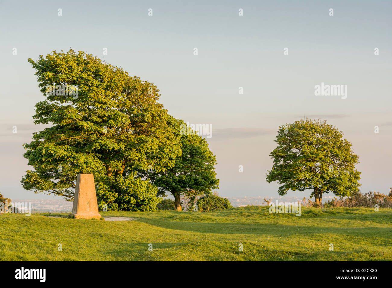 Trig point (triangulation pillar) on the ancient Iron Age Hill Fort of ...