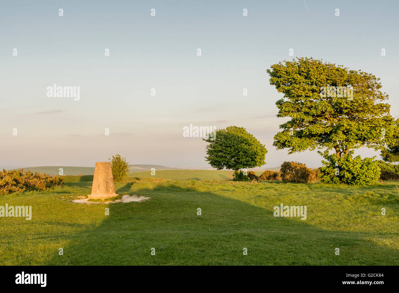 Trig point (triangulation pillar) on the ancient Iron Age Hill Fort of ...