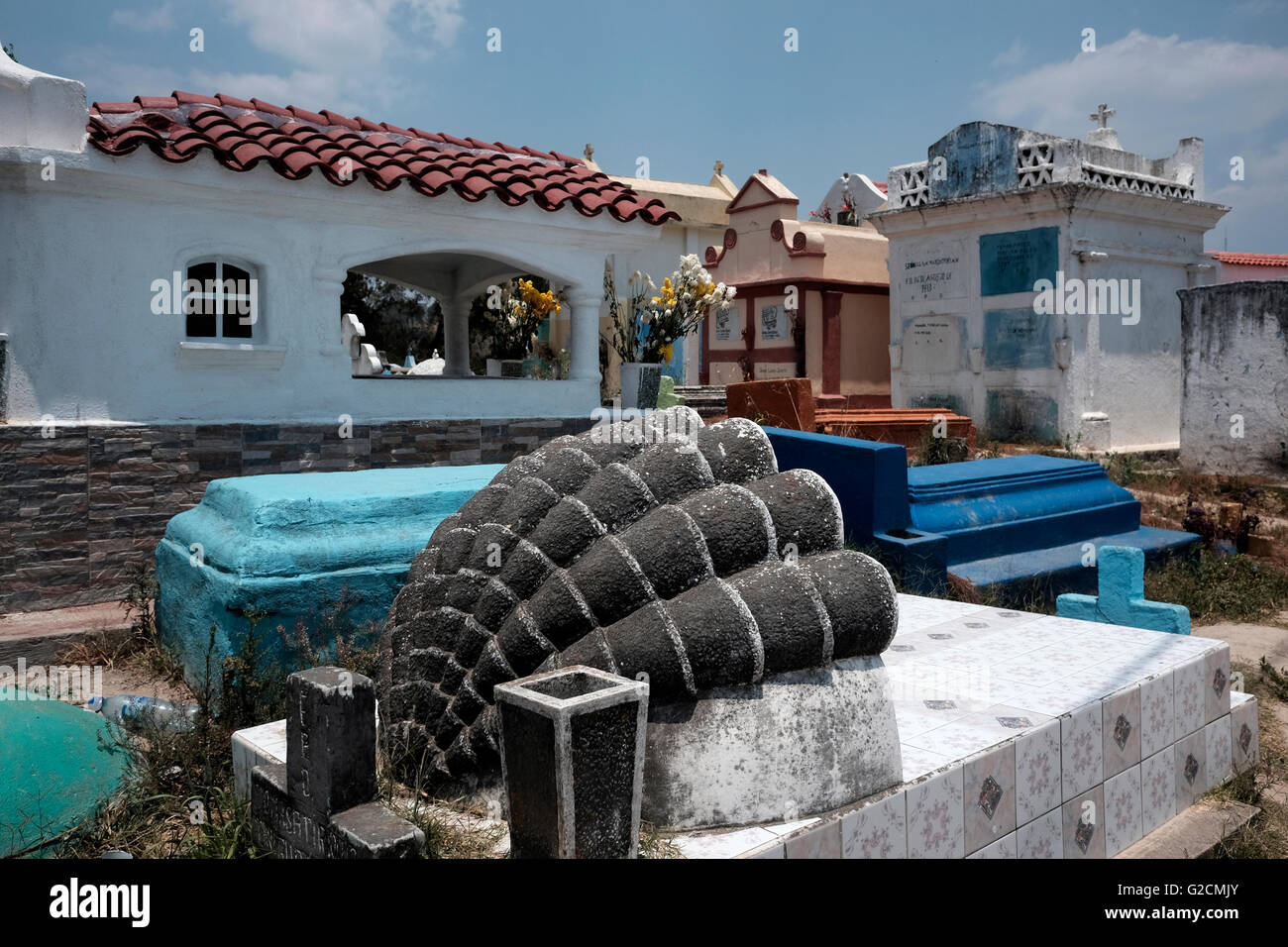 Brightly painted mausoleums and above ground crypts at the cemetery in ...