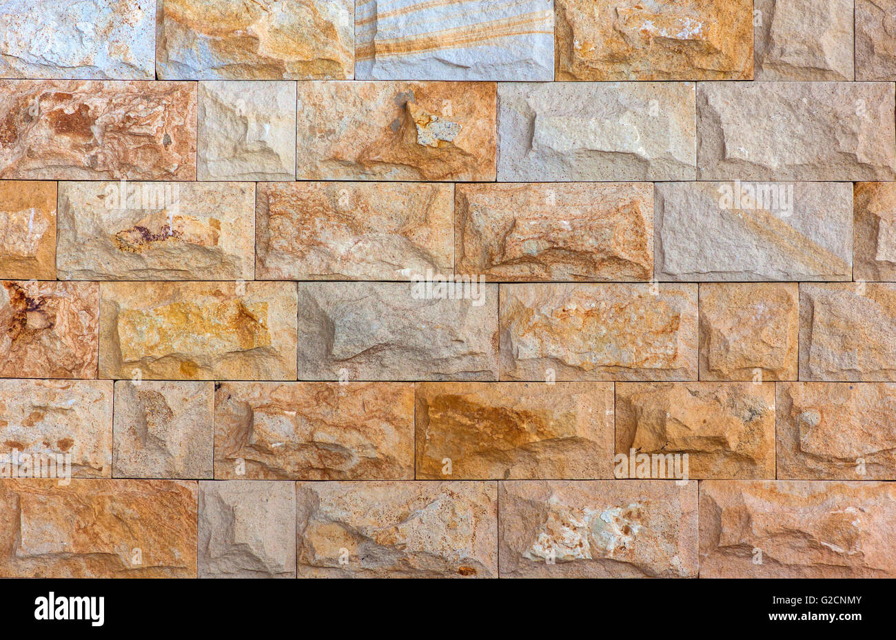 Yellow stone bricks pattern background Stock Photo - Alamy